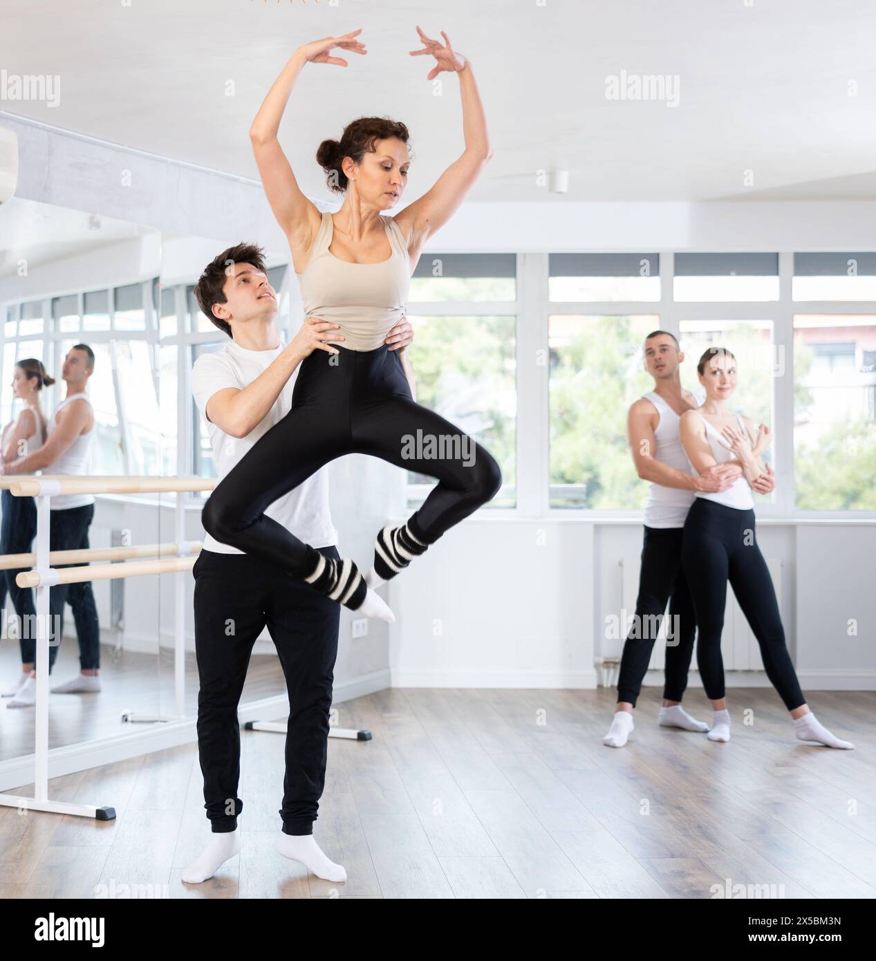 Contemporary ballet dancers couple performing graceful choreography ...