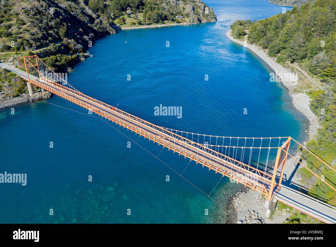 Aerial view of suspension bridge Puente General Carrera, between Lago ...
