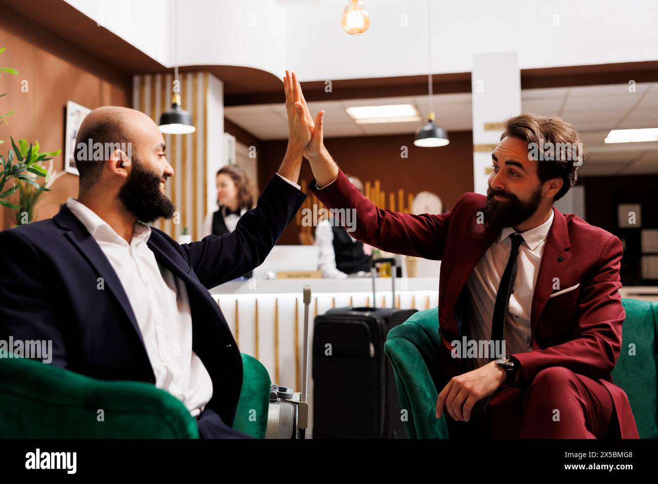 Business people team does highfive after successful international ...