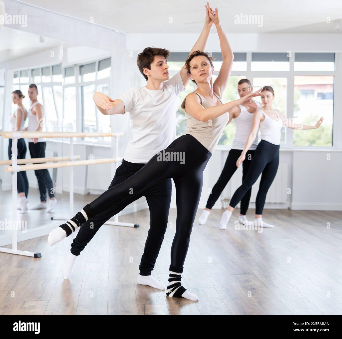 Male dancer supporting partner in hi-res stock photography and images ...
