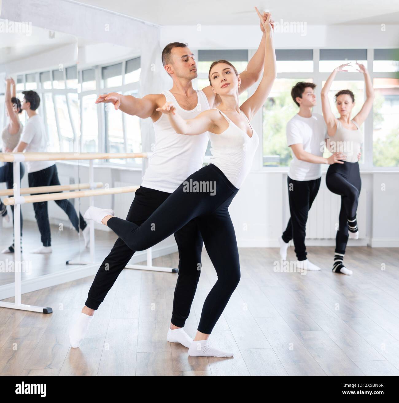 Male dancer supporting partner in hi-res stock photography and images ...