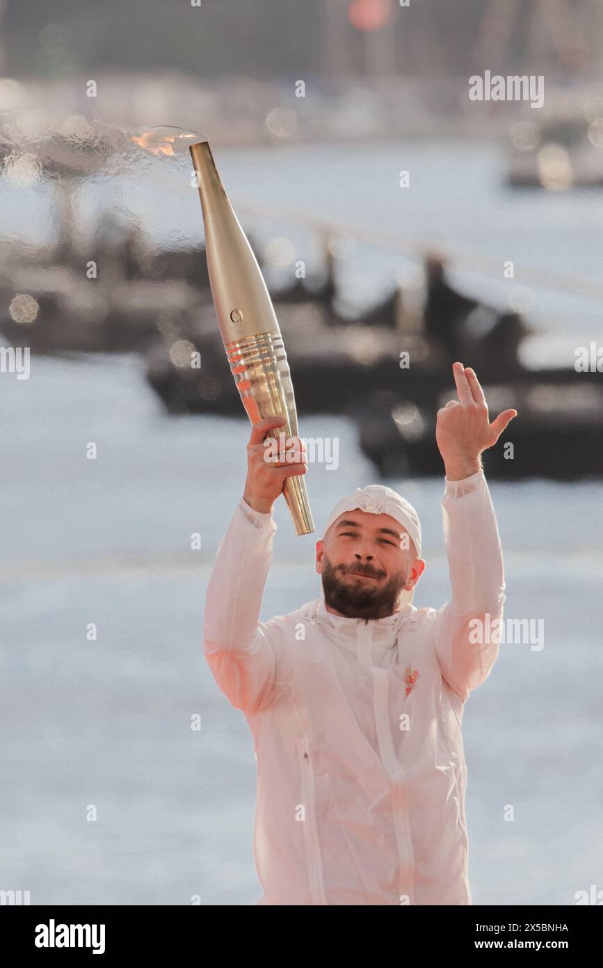 French rapper Julien Mari aka Jul lights the Olympic and Paralympic ...