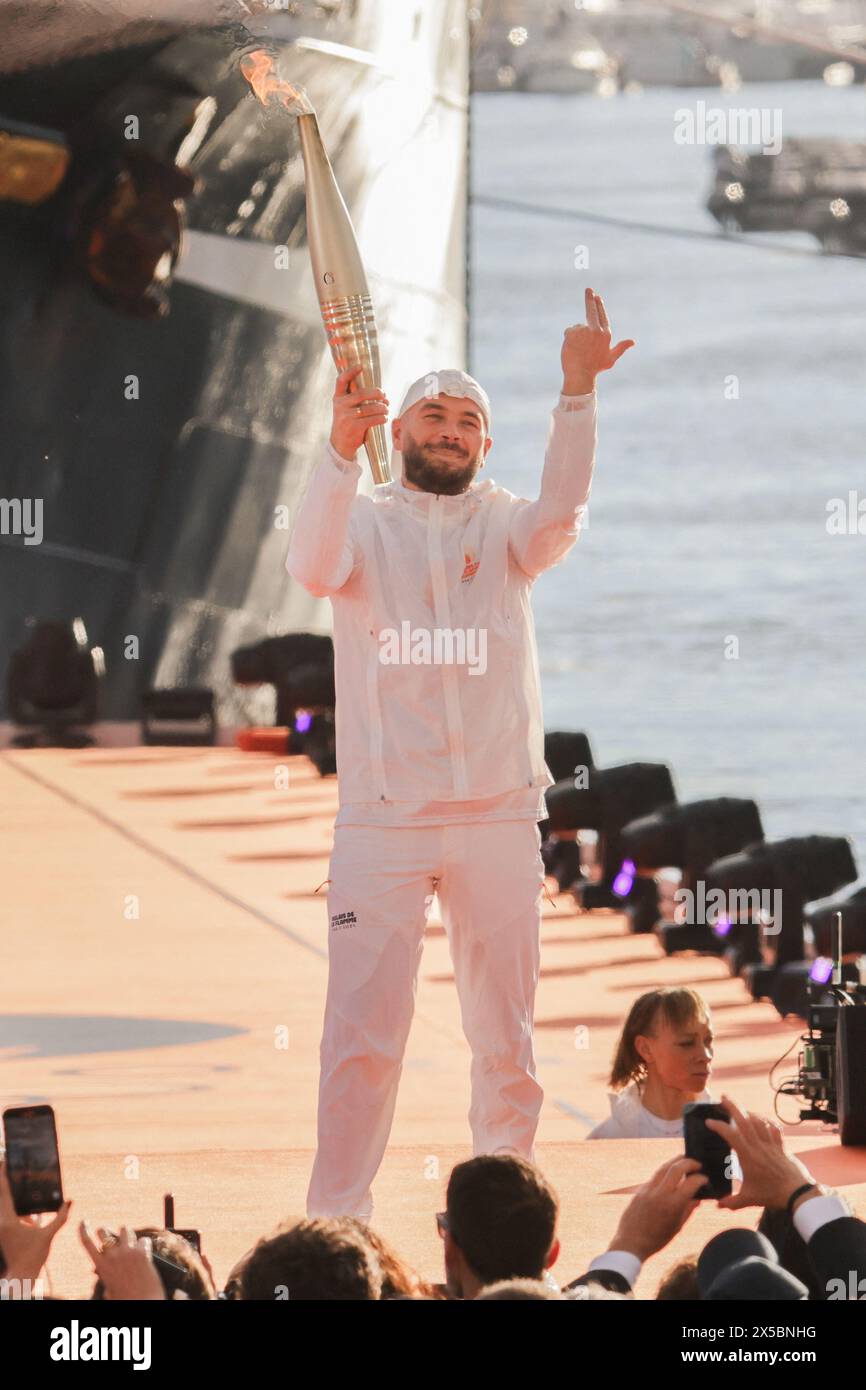 French rapper Julien Mari aka Jul lights the Olympic and Paralympic ...