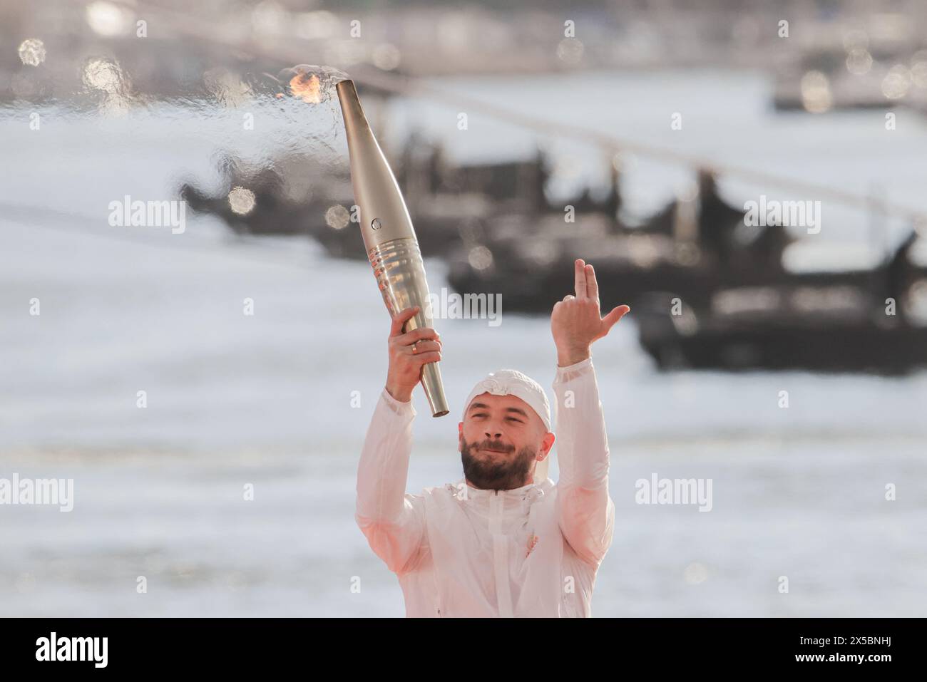 French rapper Julien Mari aka Jul lights the Olympic and Paralympic ...