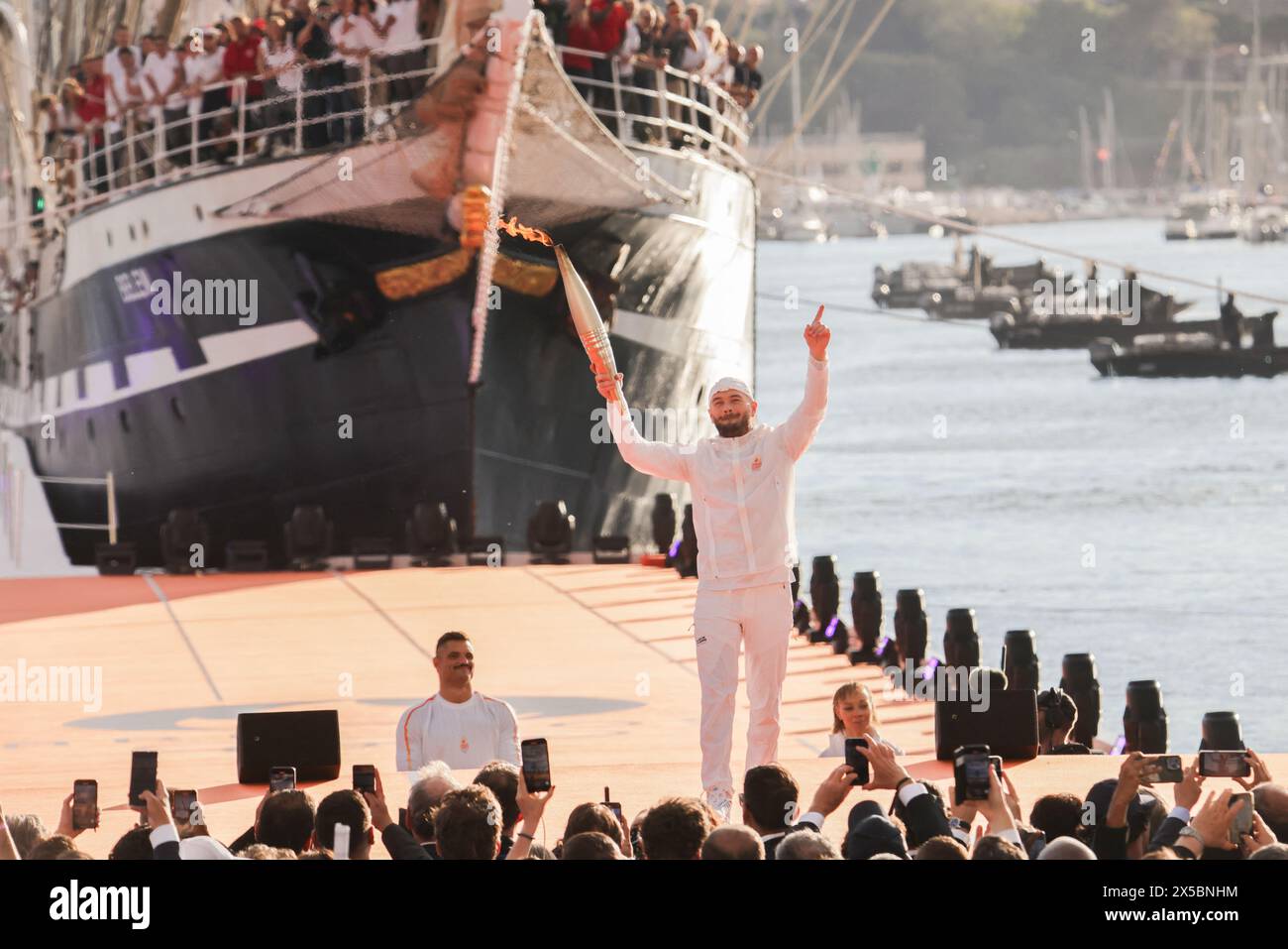 French rapper Julien Mari aka Jul lights the Olympic and Paralympic ...