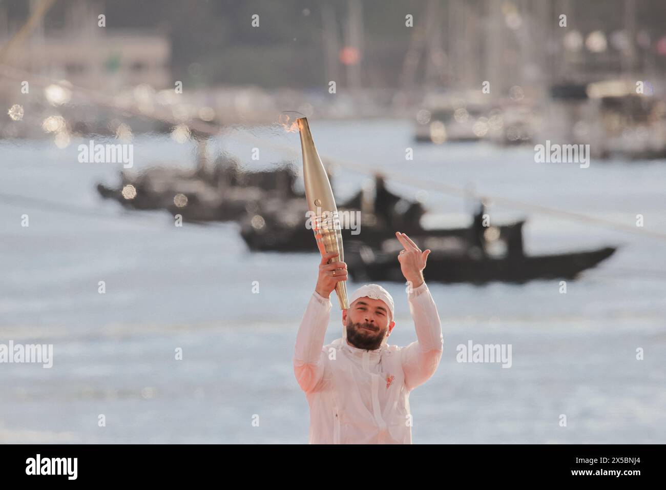 French rapper Julien Mari aka Jul lights the Olympic and Paralympic ...