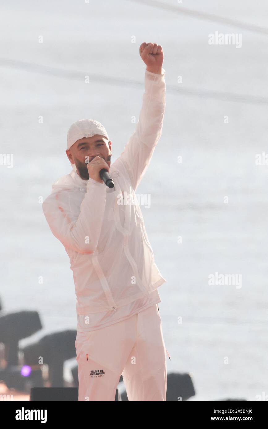 French rapper Julien Mari aka Jul lights the Olympic and Paralympic ...