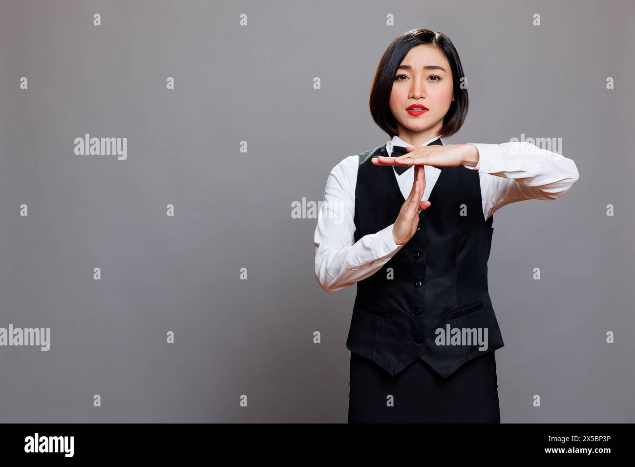 Portrait employee showing timeout gesture hi-res stock photography and ...