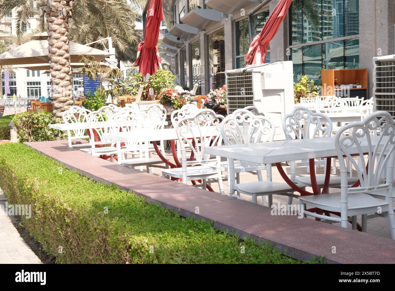 Summer terrace, outdoor city cafe, coffee house with white wooden ...