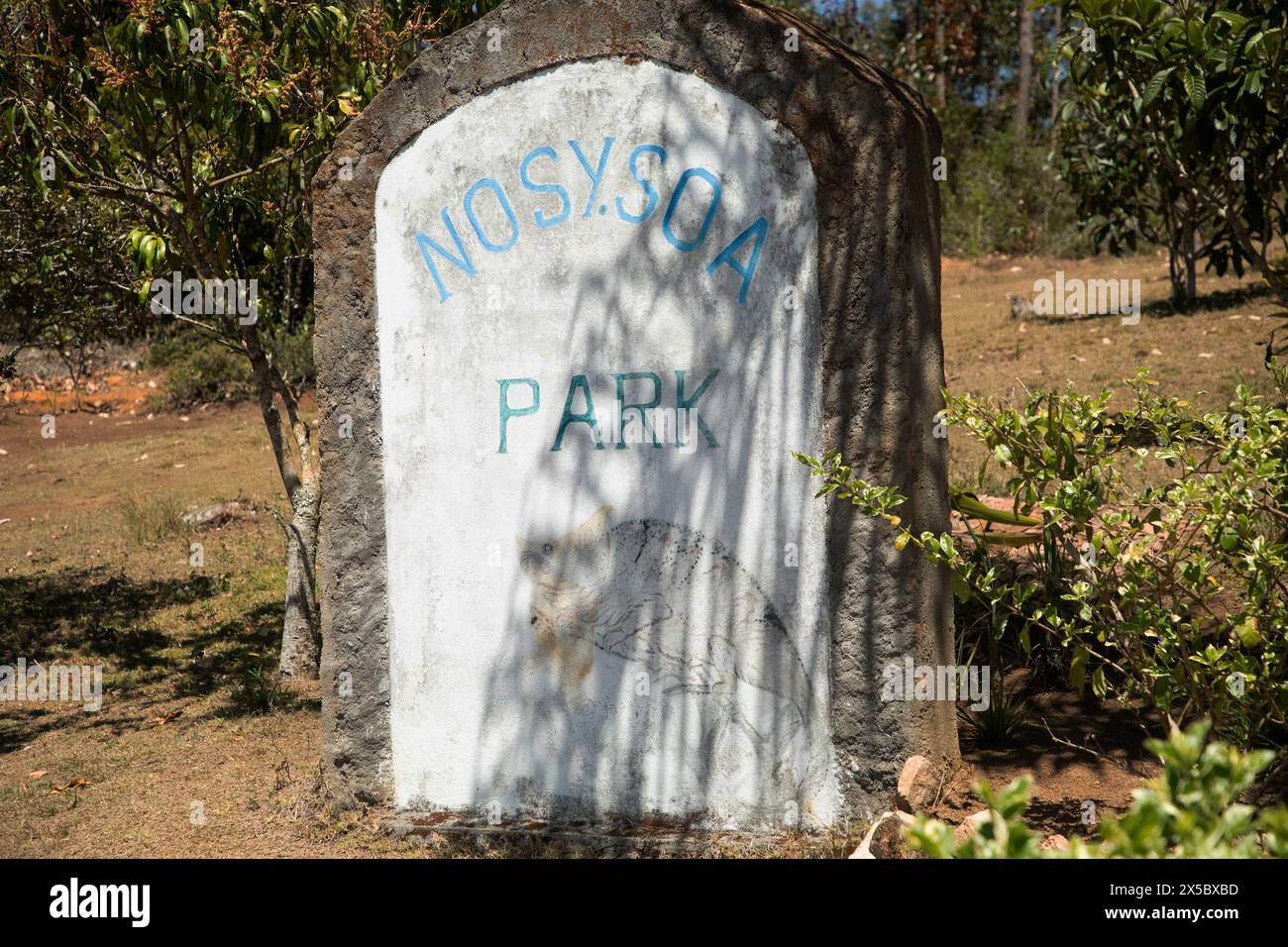 large stone with the name of the park at the entrance to Nosy Soa Park ...