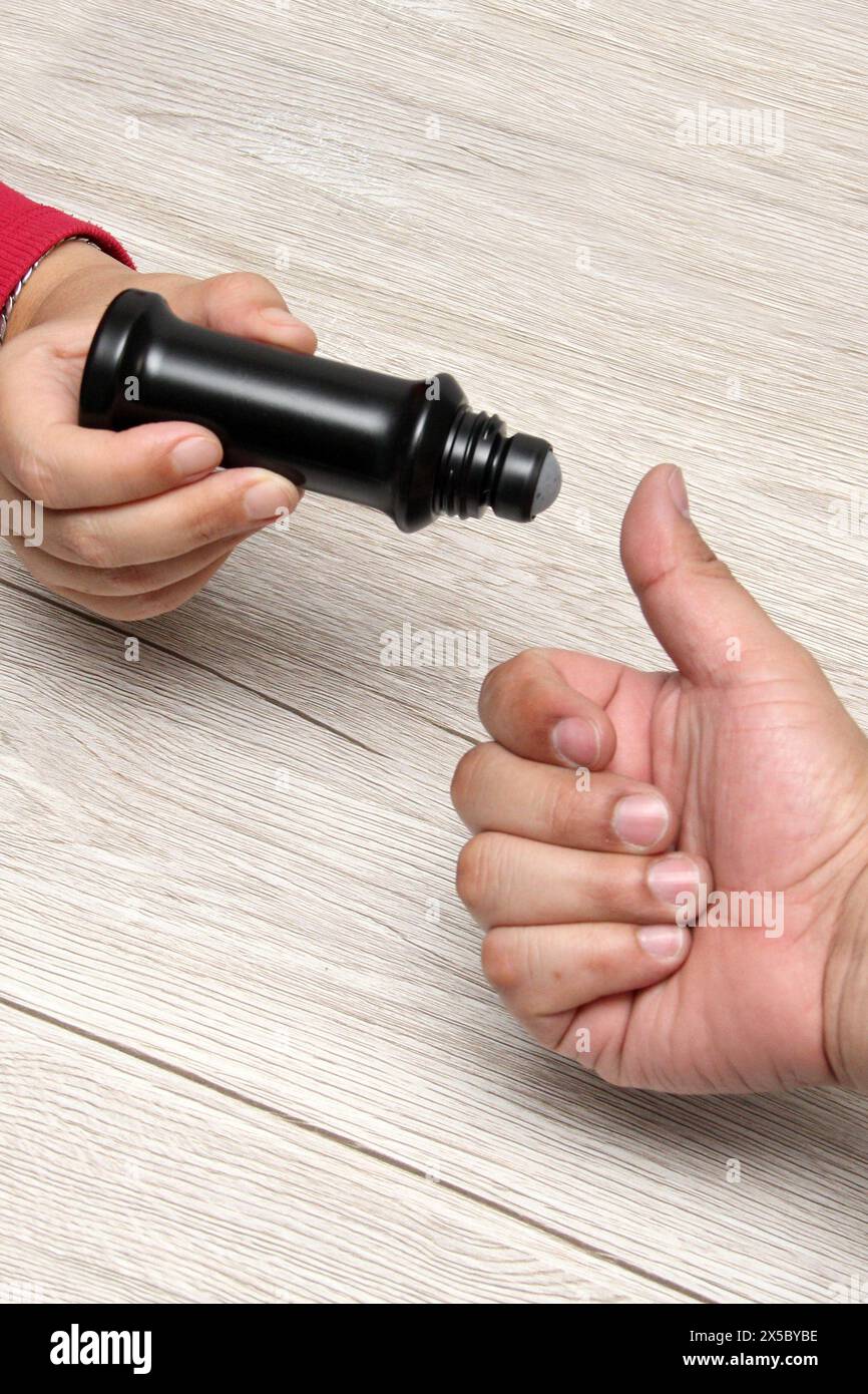 Election day in the country, the thumb of the hand is inked with ...