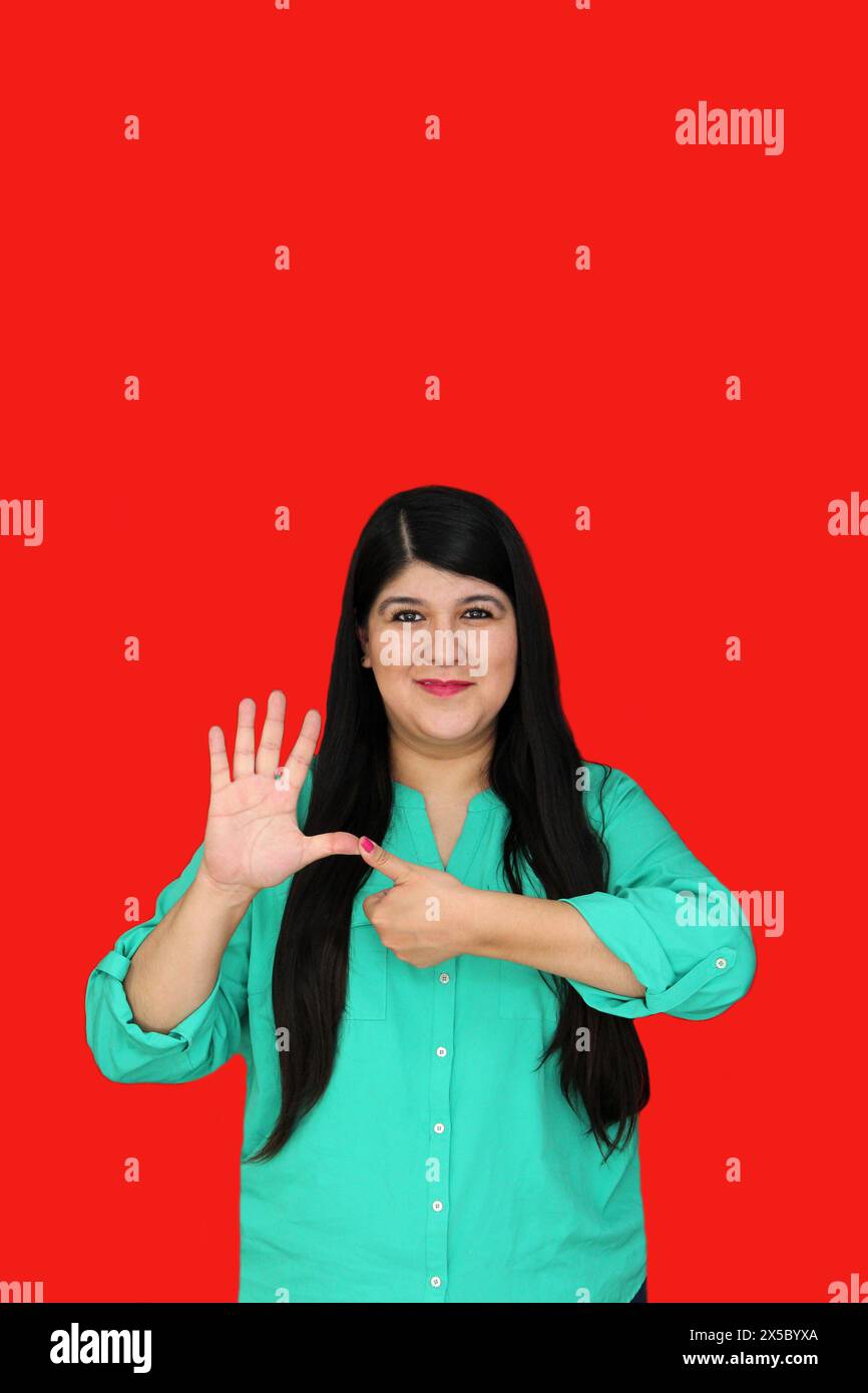 30-year-old Latina woman uses Mexican Sign Language from the deaf ...