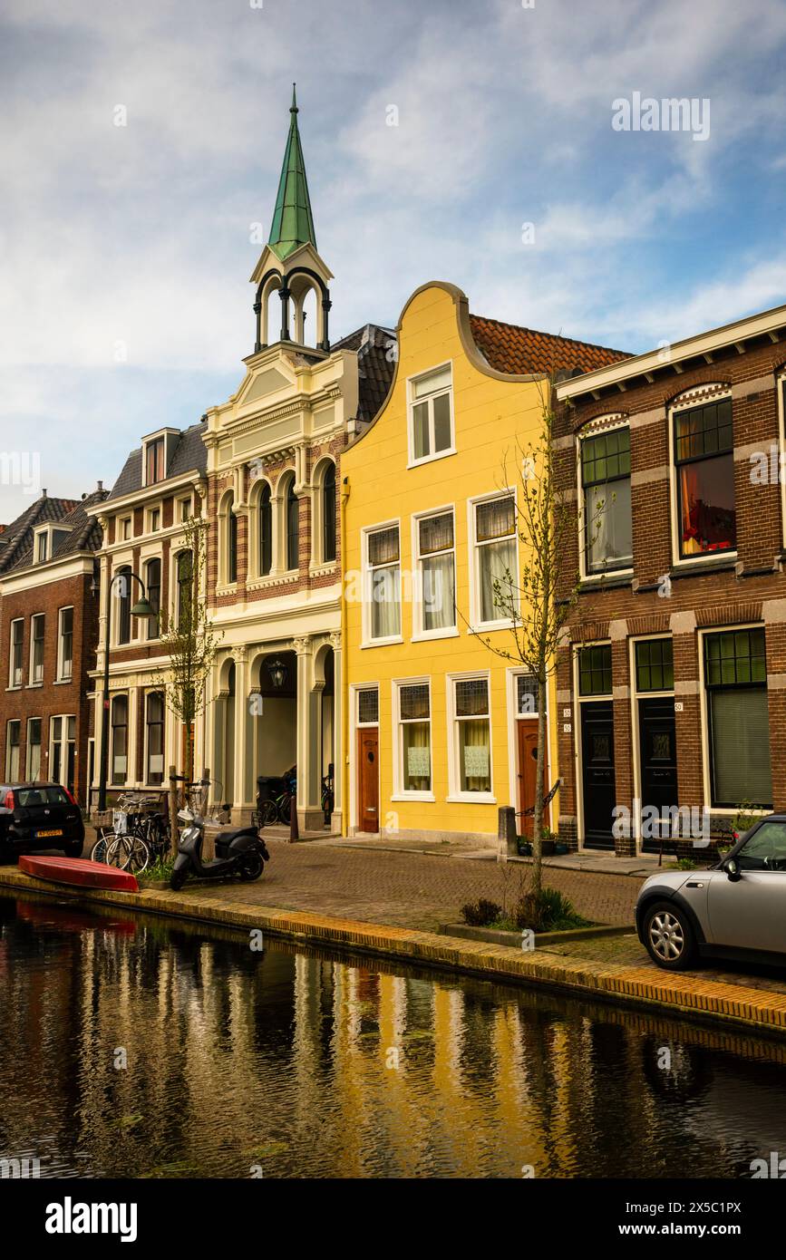 House facades and Oosterkerk church steeple, now a home, on the ...