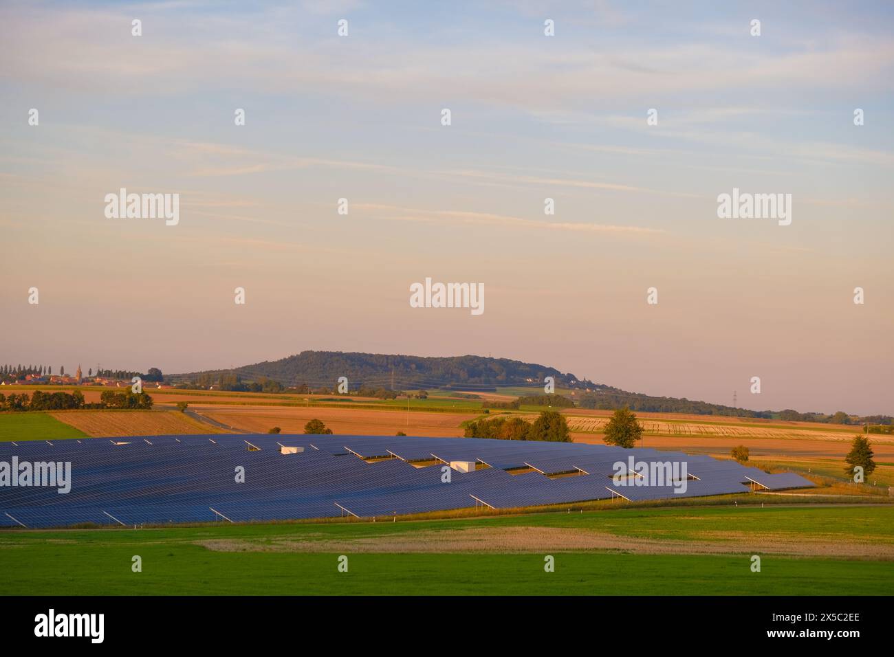 Solar panels group in a field under the sky .Green energy. Renewable ...