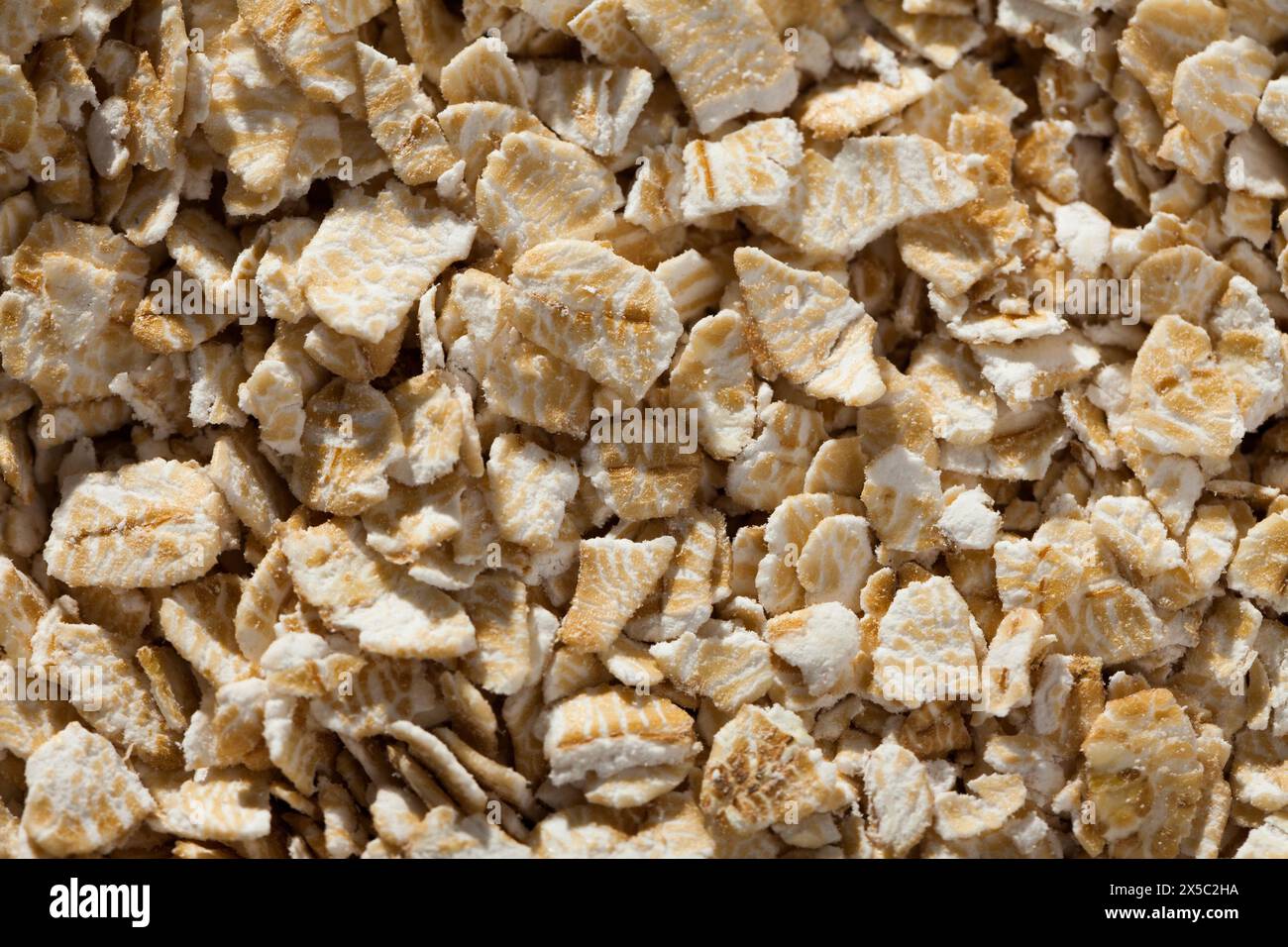 Oat flakes as background Stock Photo - Alamy