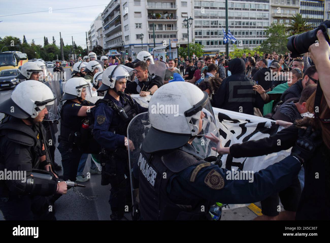 Athens, Greece. 07th May, 2024. Police push protesters back during a ...