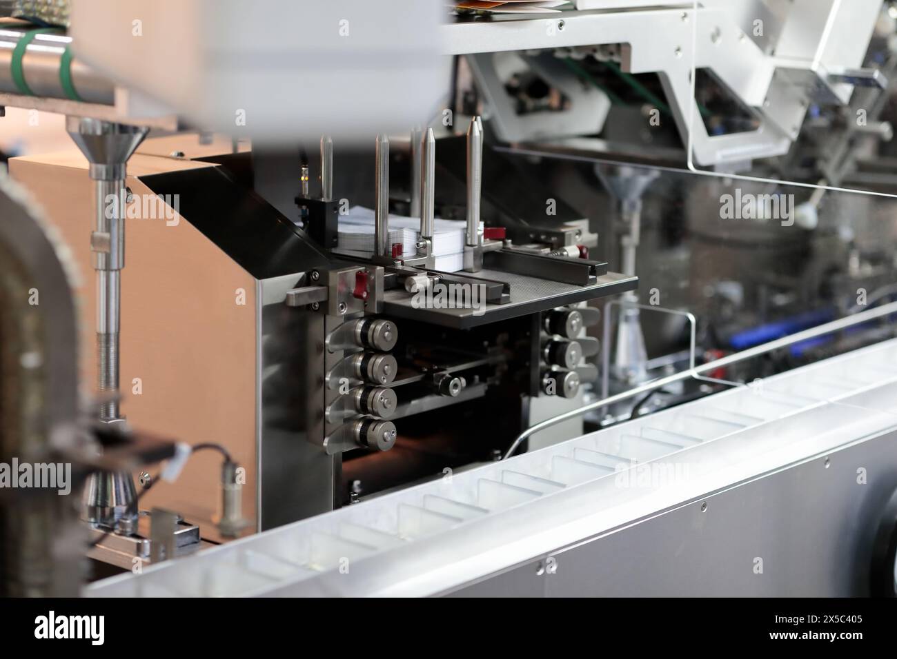 Automatic tablet carton packaging machine closeup. Cartoning machine ...