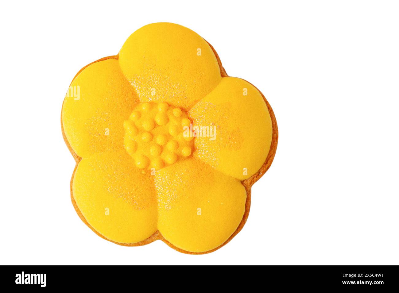 Dessert flower. Yellow gingerbread flower with five petals isolate on ...