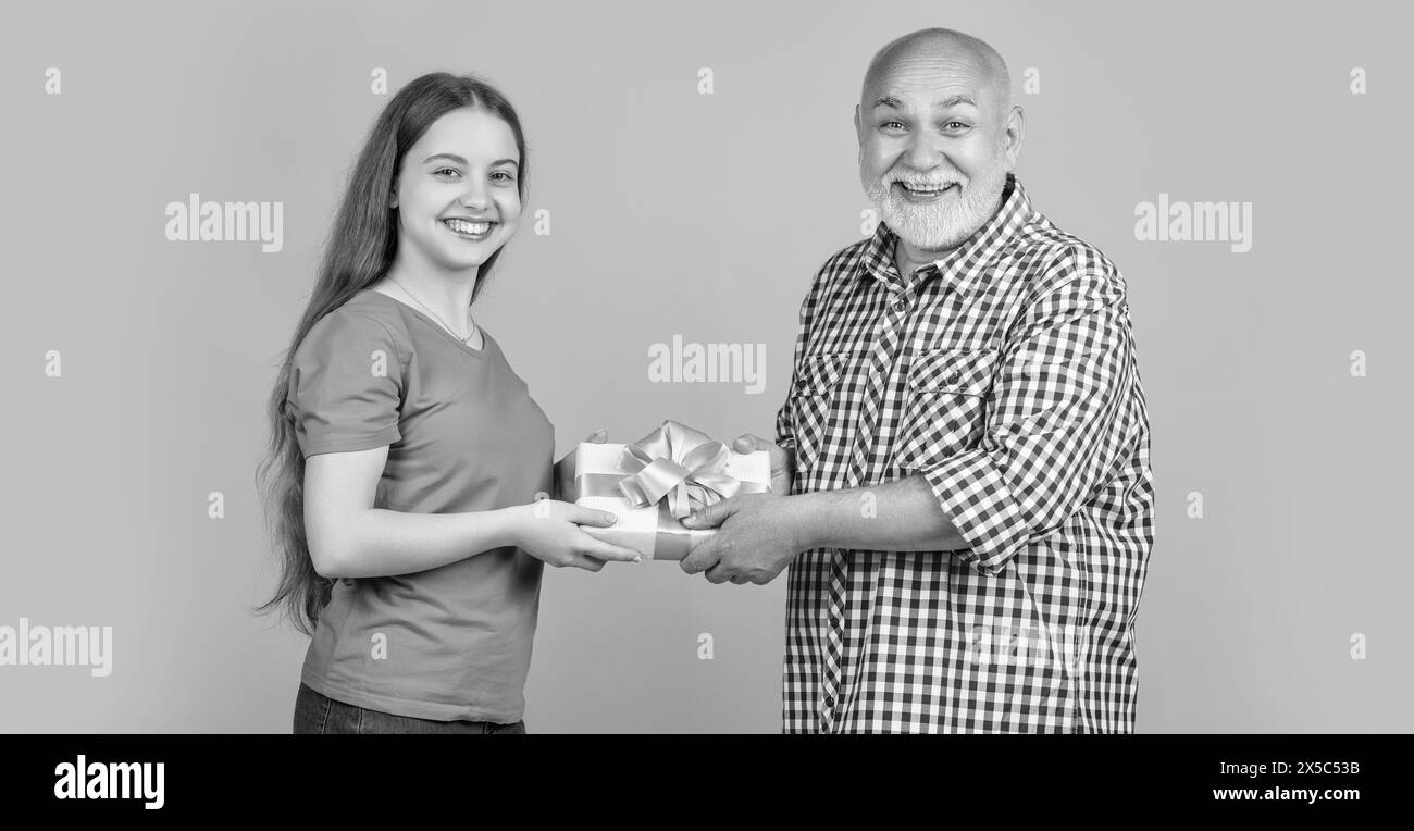 Glad child grandfather present hi-res stock photography and images - Alamy