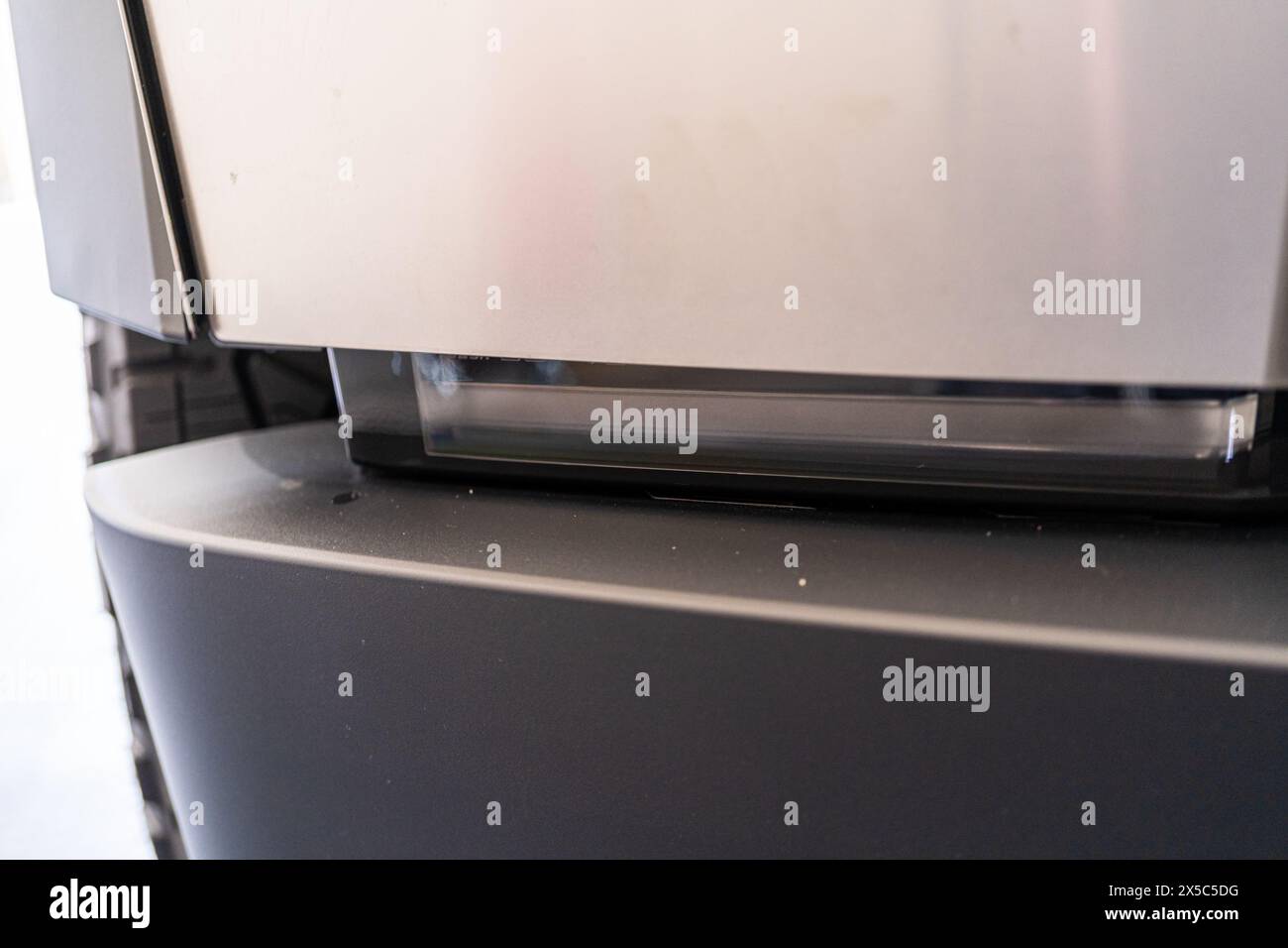 Close-Up View of the Tesla Cybertruck Side Panel and Tire Stock Photo ...