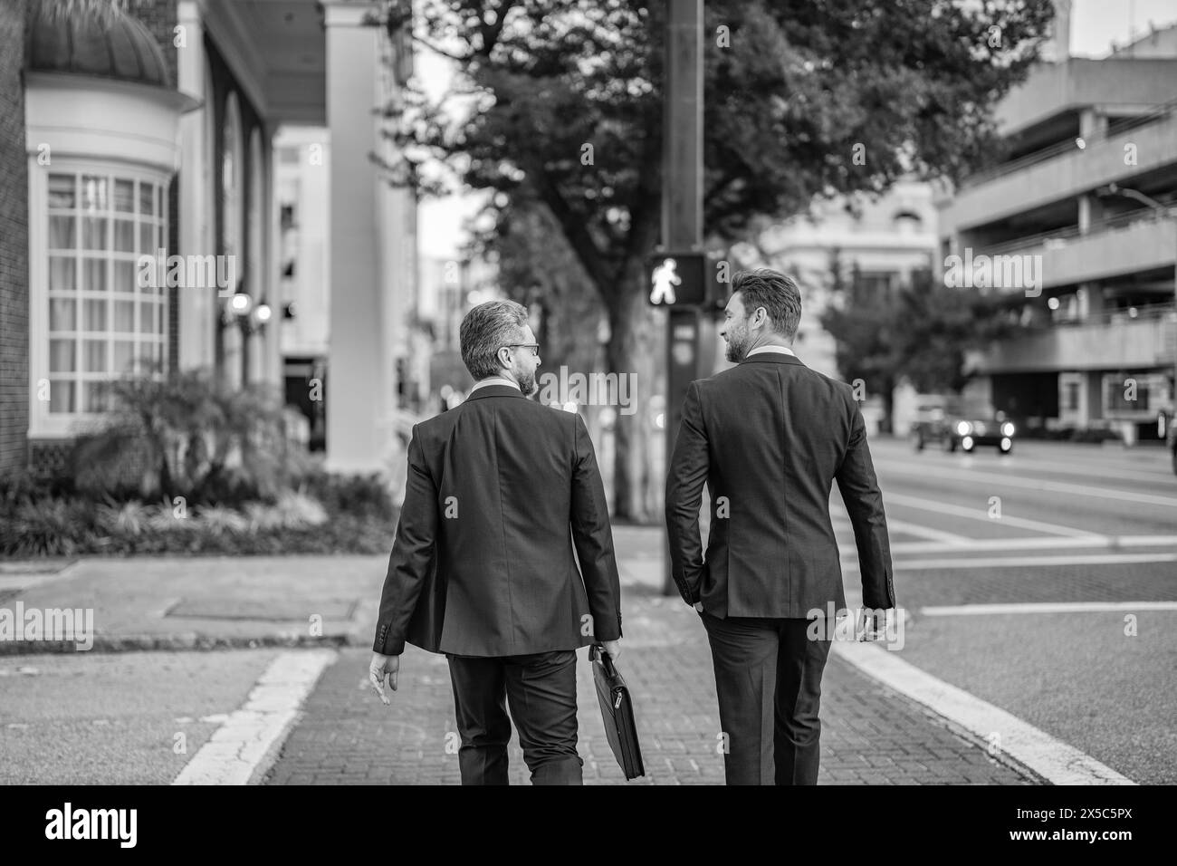 back view of business men coworker outdoor. business men coworker in ...