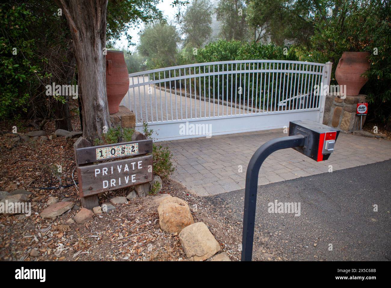 A metal gate blocks access to a private drive in Ojai, California, USA ...