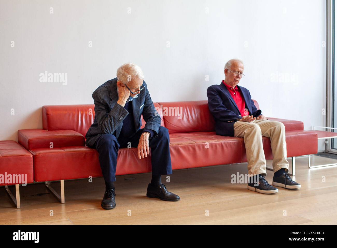 An upholstered bench provides a place for people to sit and ponder life ...