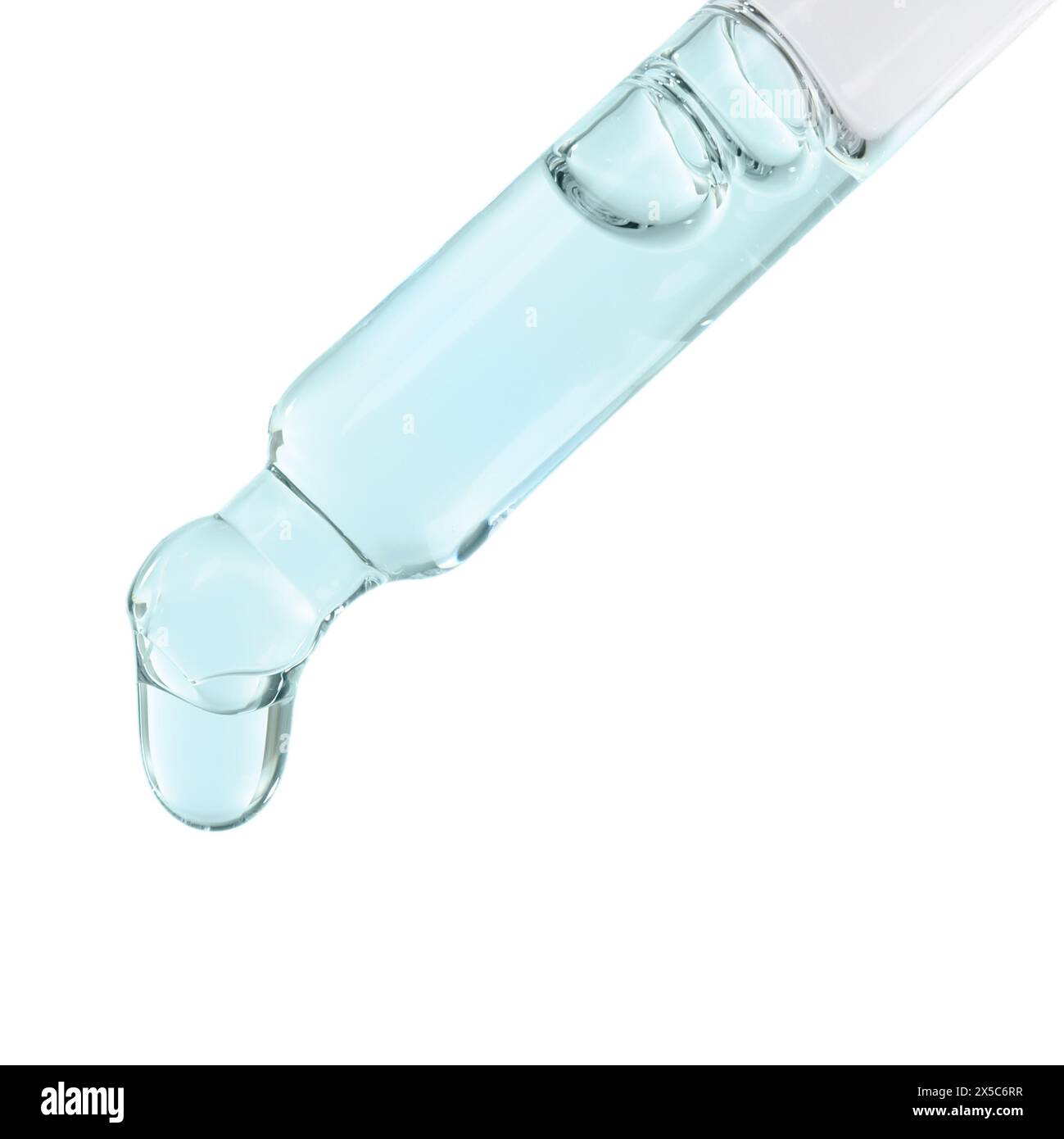 Dripping medical drops from pipette on white background Stock Photo - Alamy