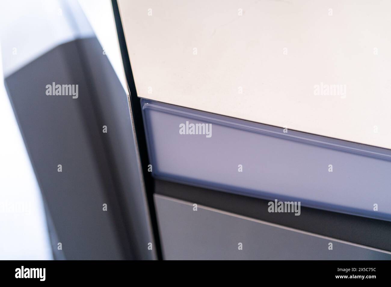 Close-Up View of the Tesla Cybertruck Side Panel and Tire Stock Photo ...