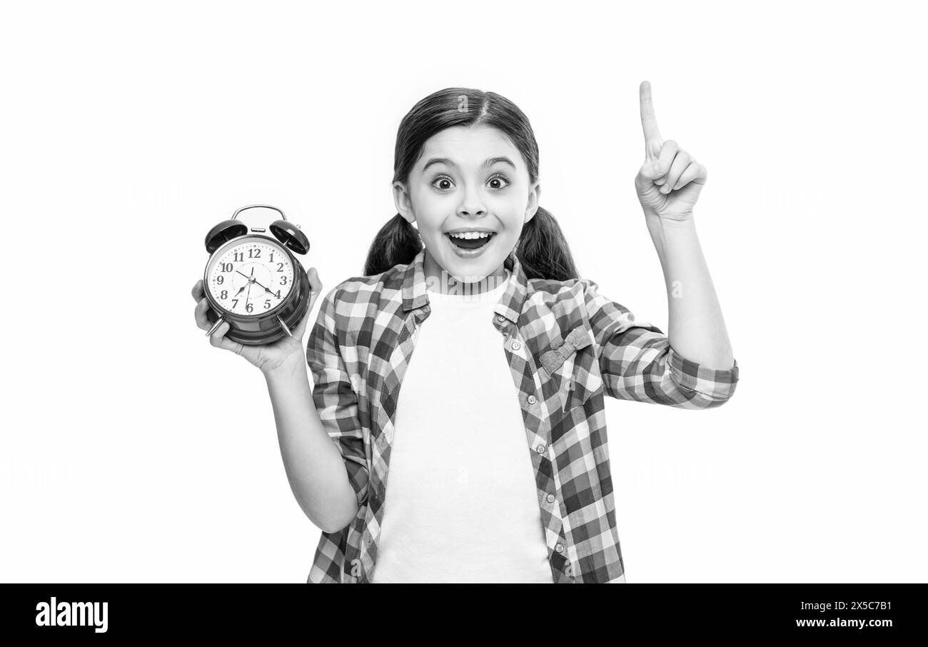 photo of inspired punctual teen girl with alarm clock. punctual teen ...