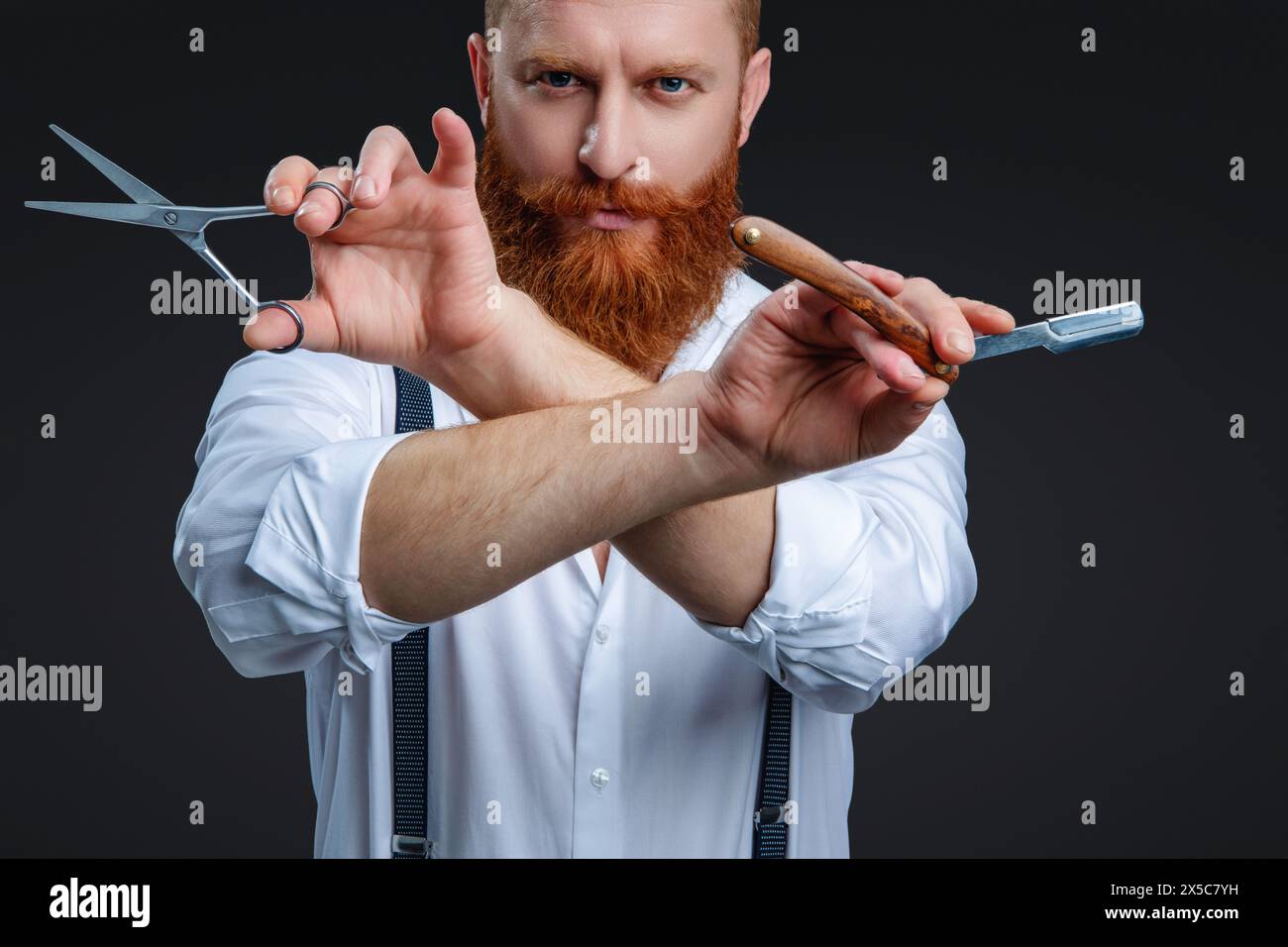 Barber man. Man barber with razor blade do haircut. Man barber making a ...