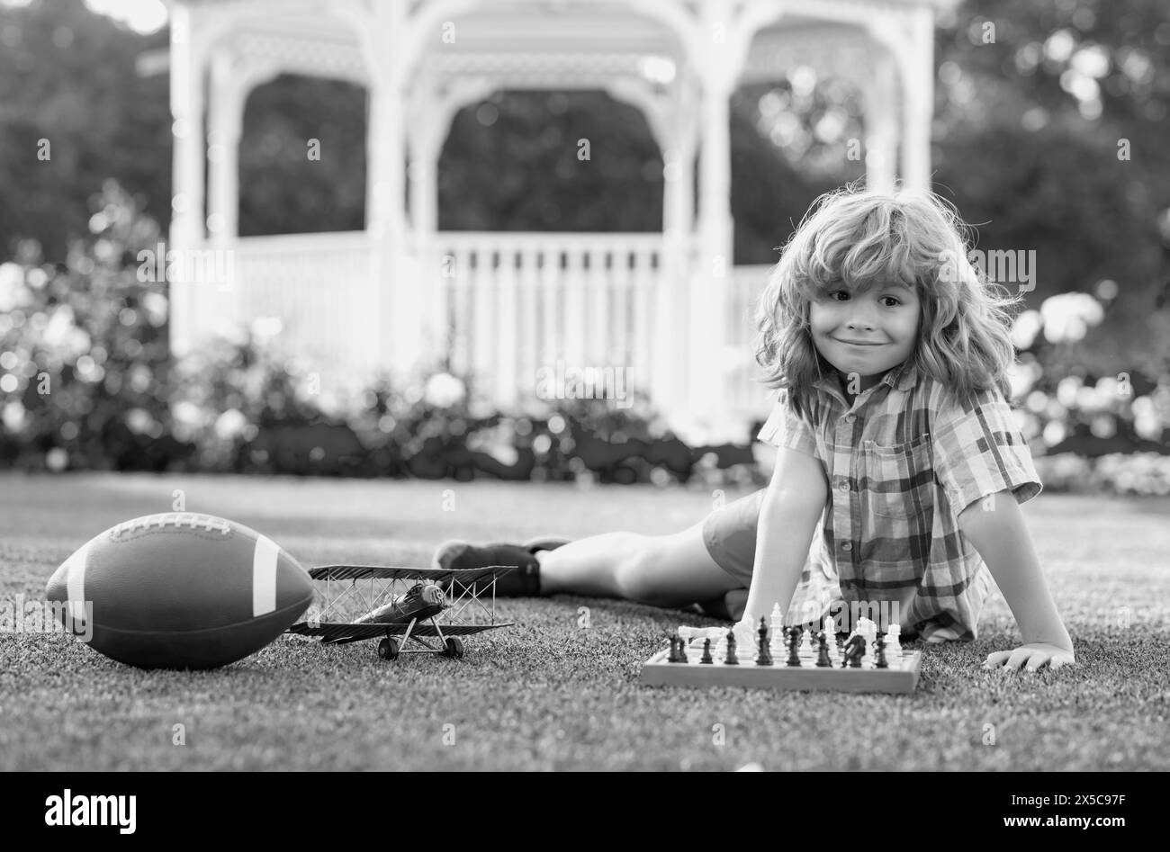 Dream kids and childhood concept. Little child play chess. Kid playing ...