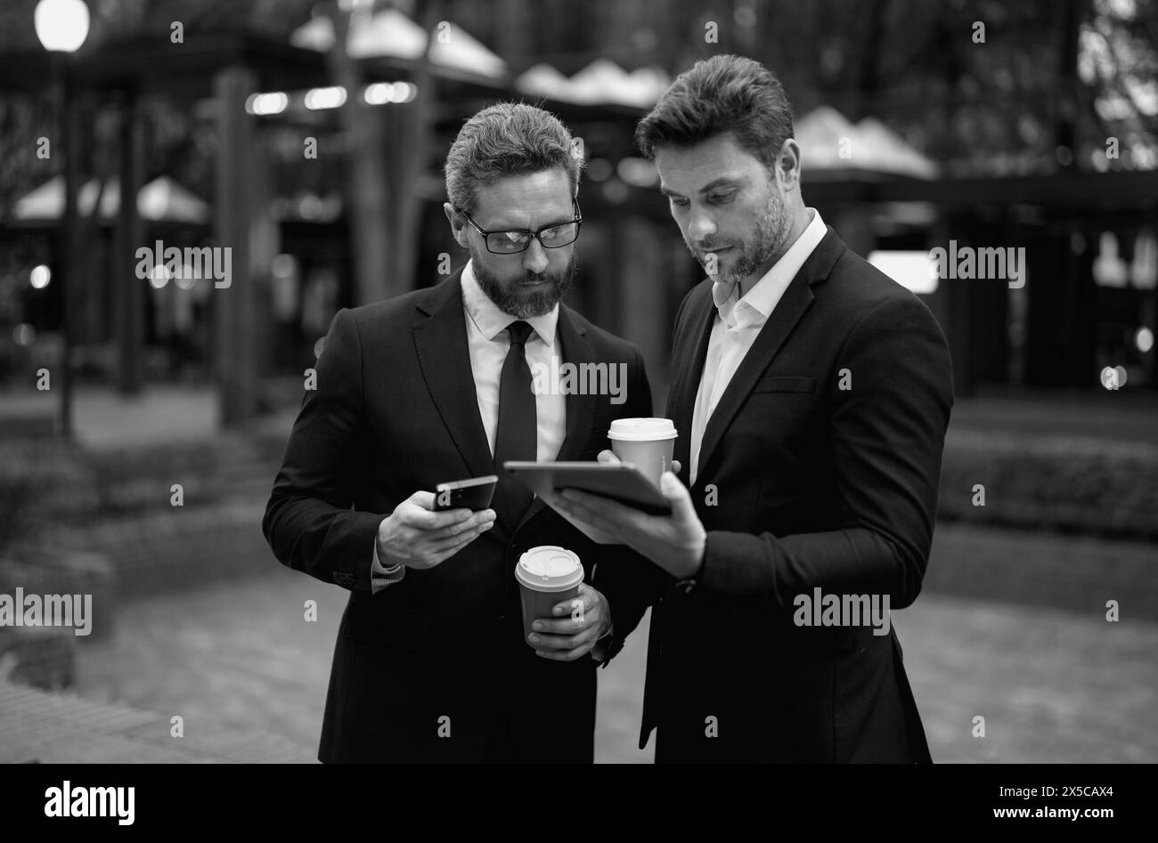 Two men business partners using Black and White Stock Photos & Images ...