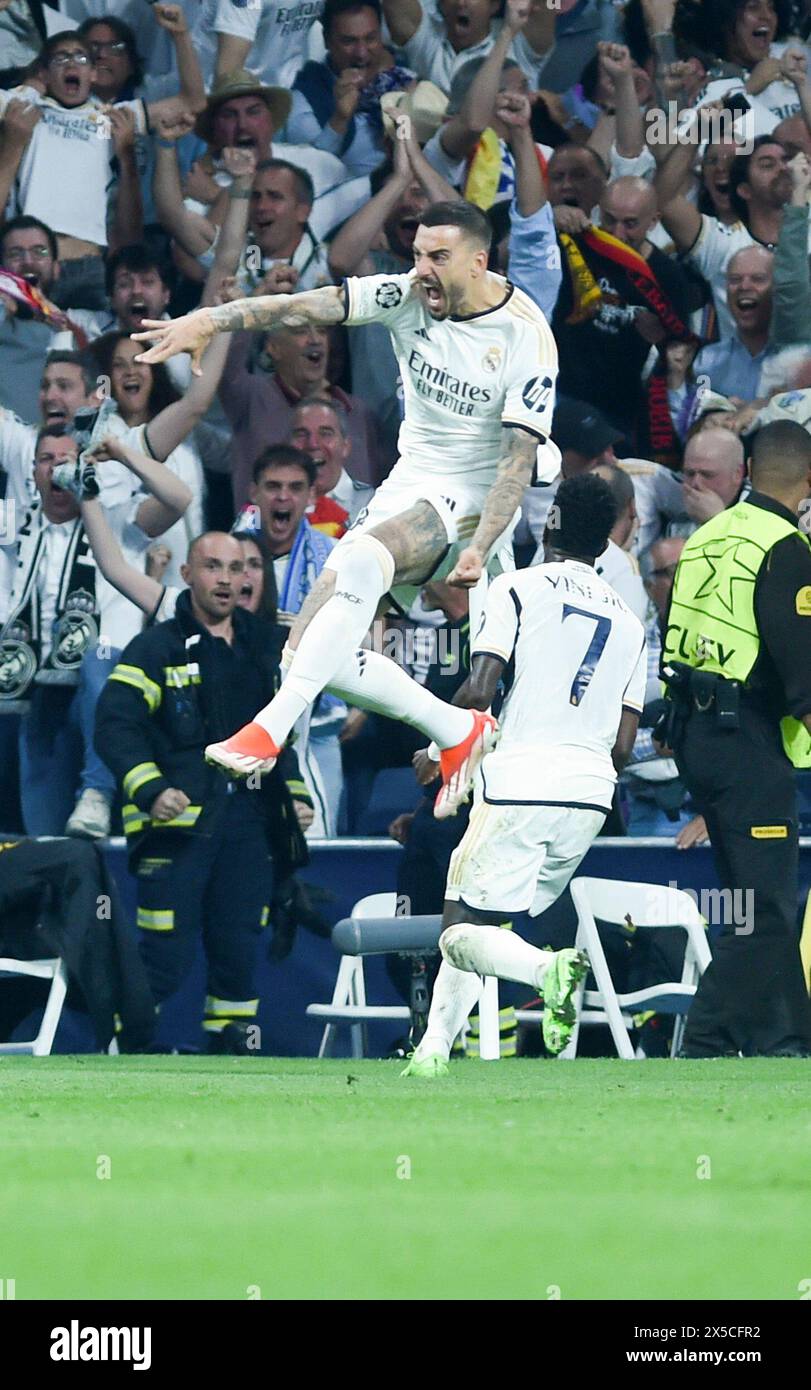 Madrid, Spain. 8th May, 2024. Joselu (top) of Real Madrid celebrates ...