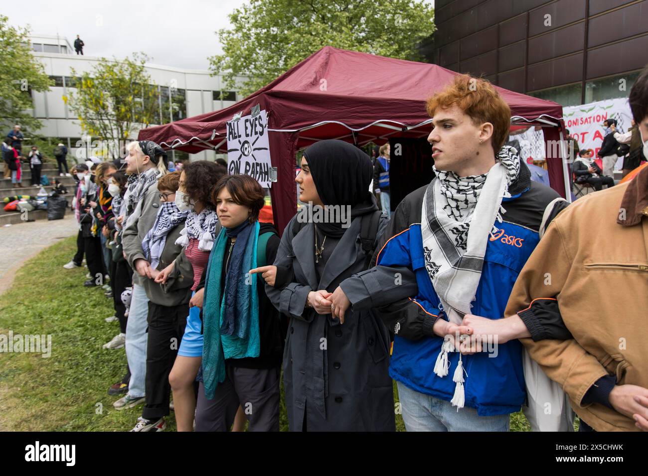 A human chain in front of a tent and an All eyes on Rafah sign during ...