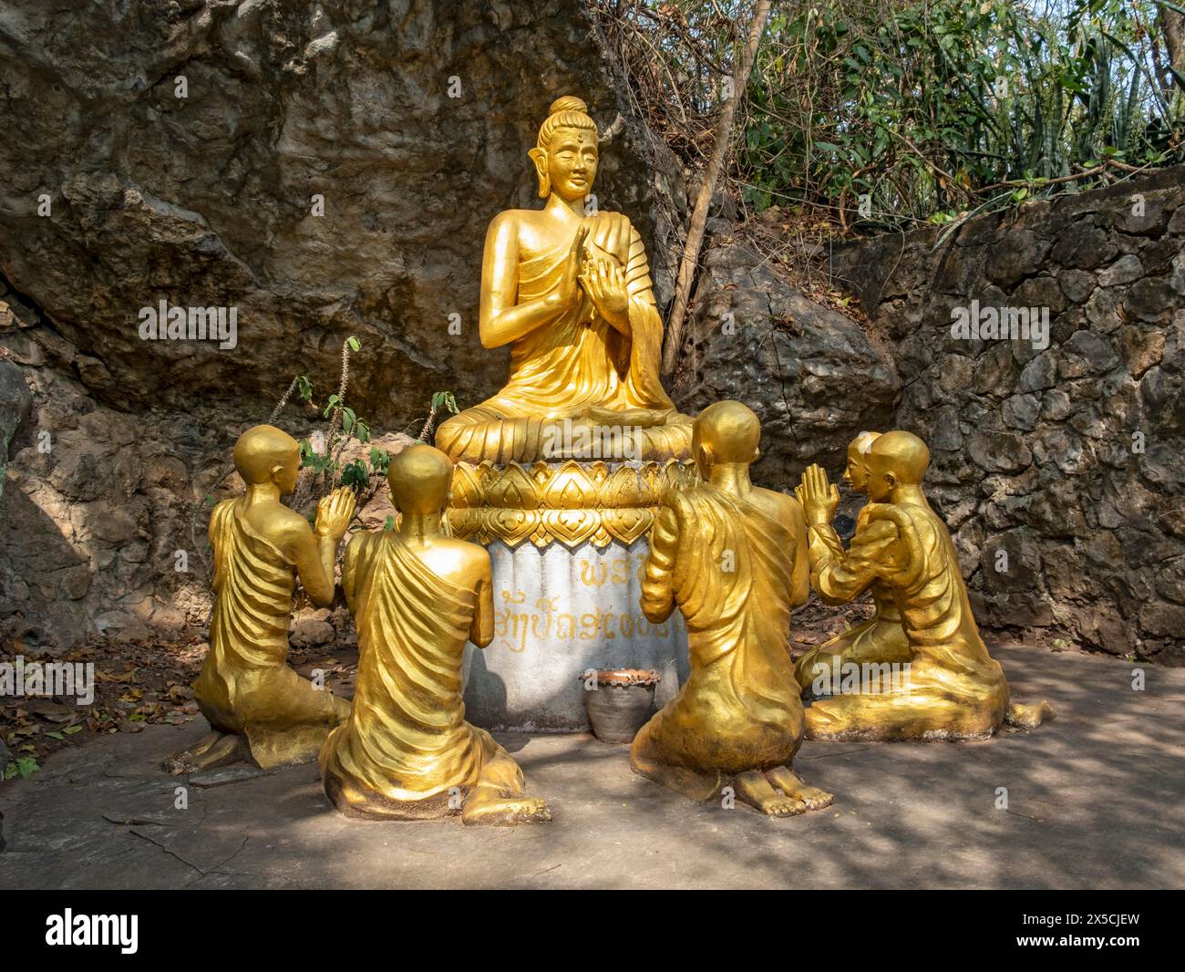 Statue of Buddha teaching disciples, Phousi or Phu Si Hill, Luang ...