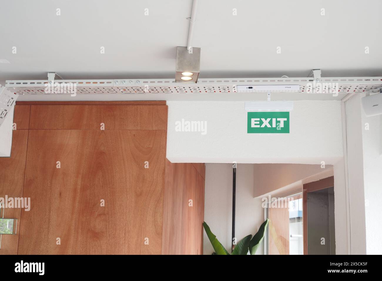 emergency exit door inside of a building Stock Photo - Alamy
