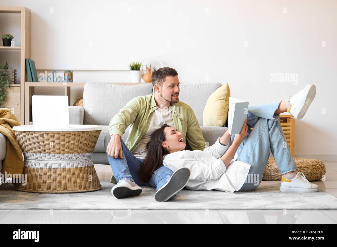 Happy lovely couple reading book hi-res stock photography and images ...