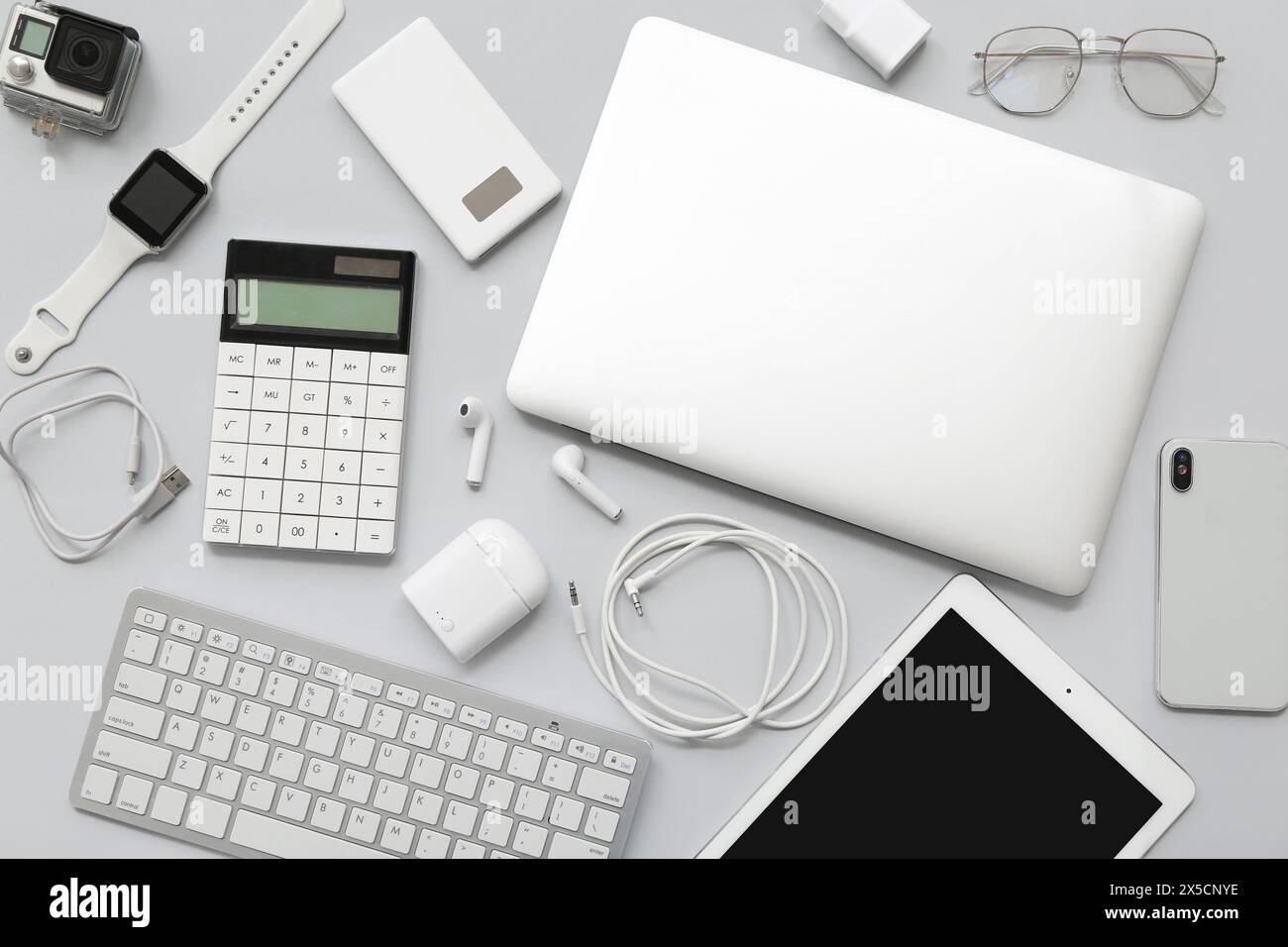 Set of different modern gadgets on grey background Stock Photo - Alamy