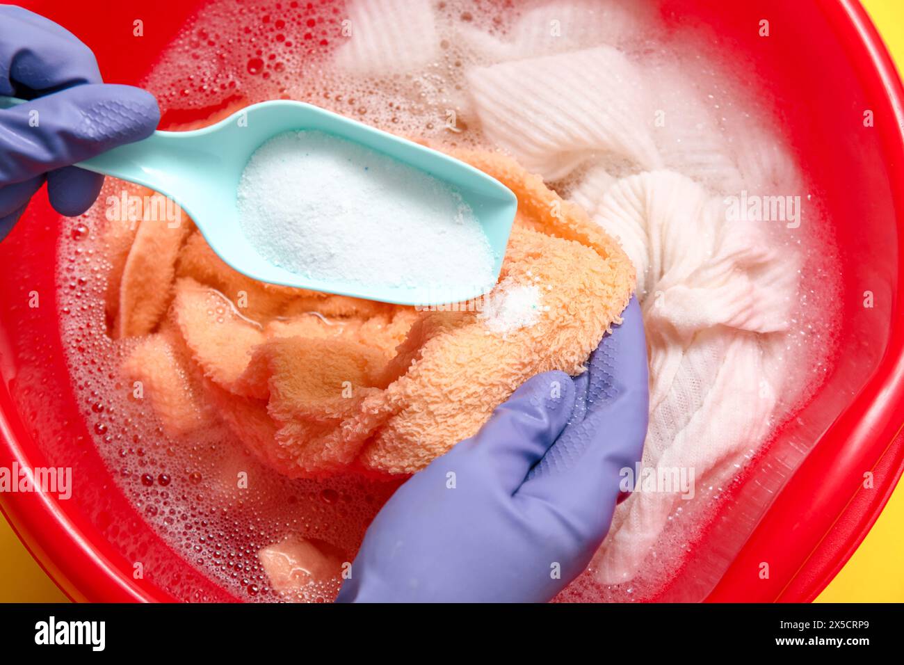 Closeup person adding detergent washing hi-res stock photography and ...