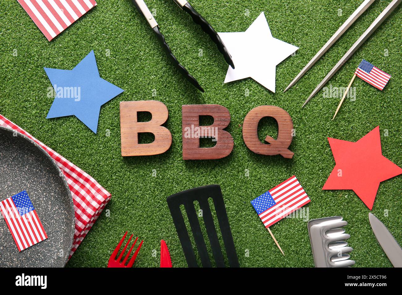 Composition with wooden letters BBQ, barbecue utensils and decor on ...