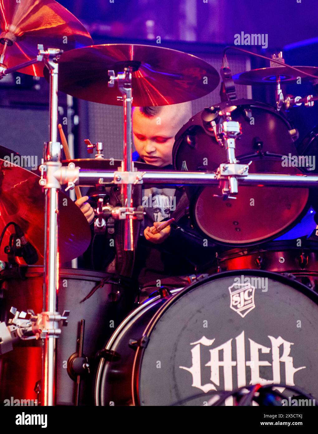 Caleb H age 9 preforming at Teddy Rocks Festival 2024 Charisworth Farm, Blandford Forum Stock ...