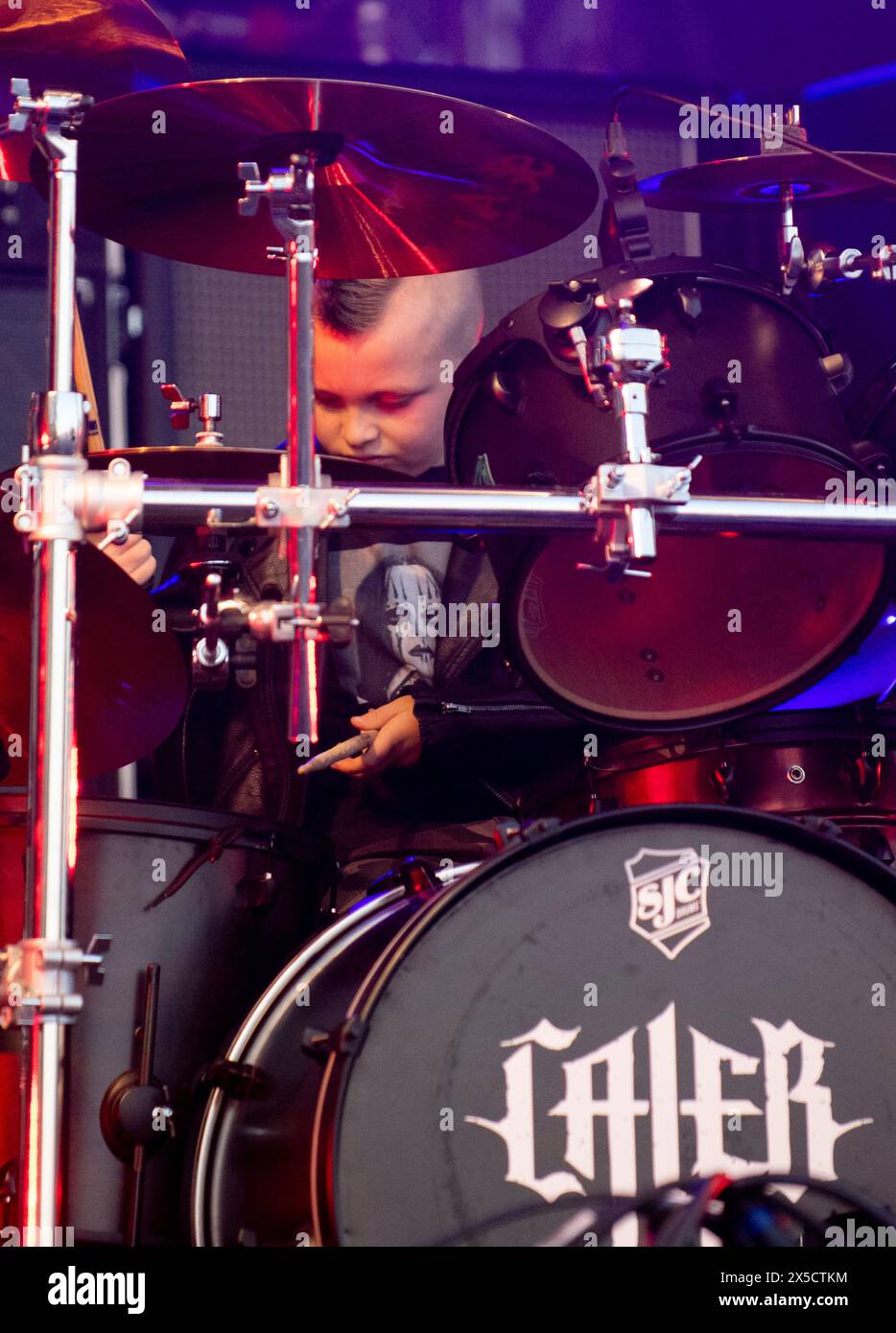 Caleb H age 9 preforming at Teddy Rocks Festival 2024 Charisworth Farm, Blandford Forum Stock ...