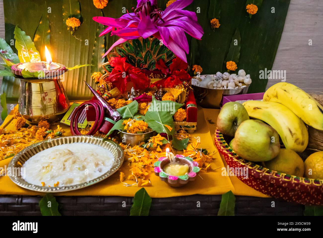 holy hindu god worship with flowers at durga pooja festival at night ...