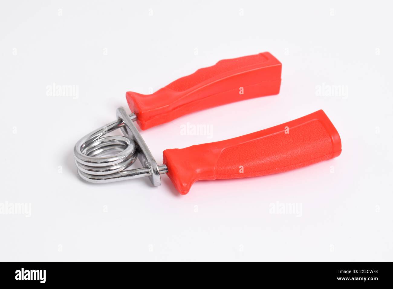 Red Handgrip isolated on white background. Hand grip exercise equipment ...