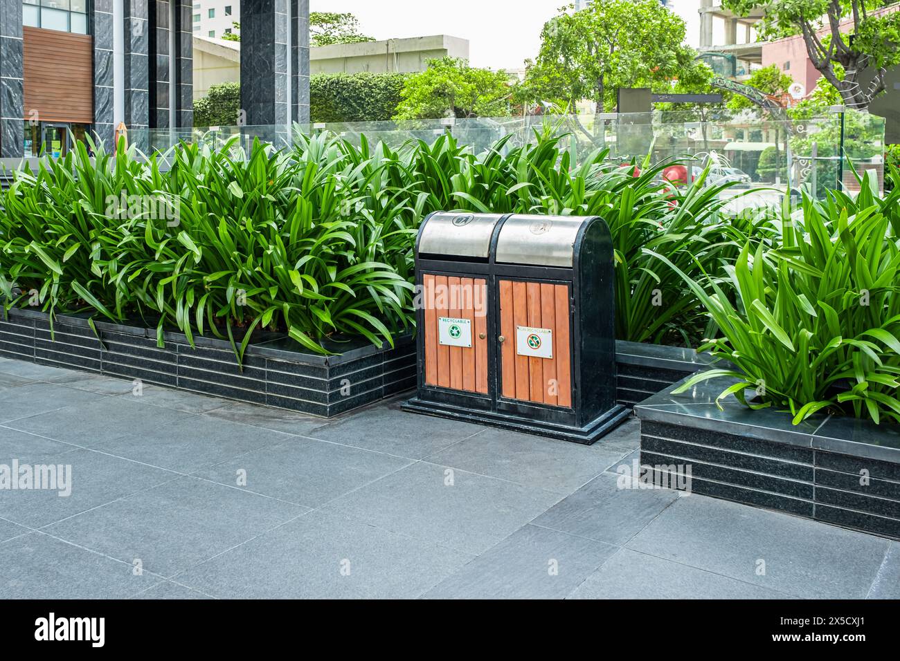Trash bin containers for sorting recyclable and non-recyclable waste on ... Trash bin containers for sorting recyclable and non-recyclable waste on ...