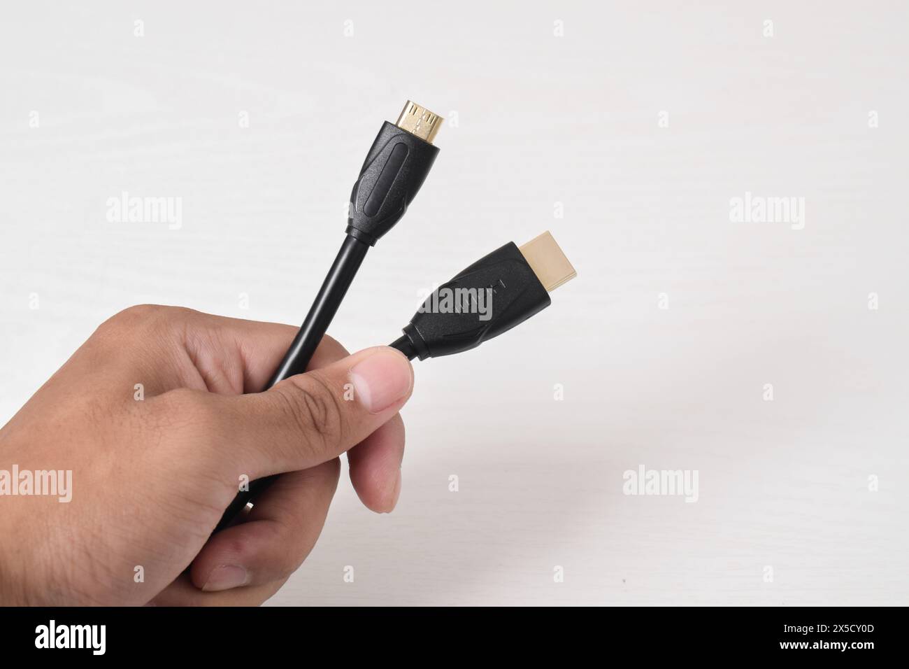 HDMI mini HDMI adapter isolated on white background Stock Photo - Alamy