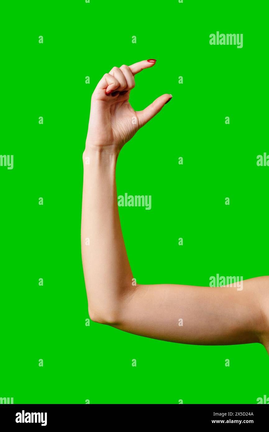 Womans Arm Hand Sign Raised in the Air Stock Photo - Alamy