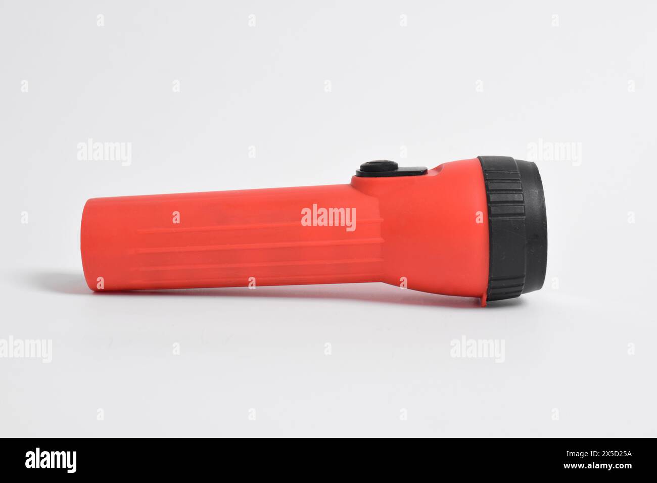 Red color flashlight isolated on white background. Red Battery-powered ...