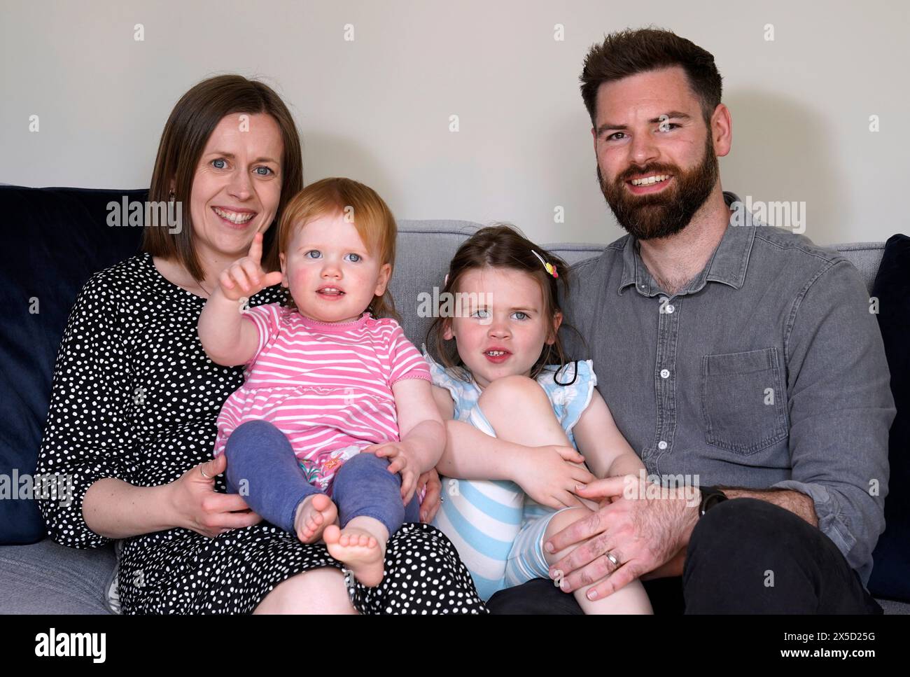 Opal Sandy (second left), who was born completely deaf because of a ...